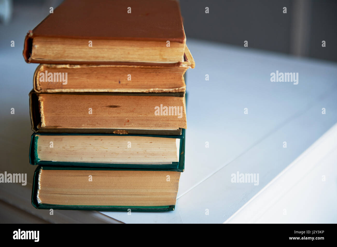 the texture is a stack of old books. Texture or background. Close up ...
