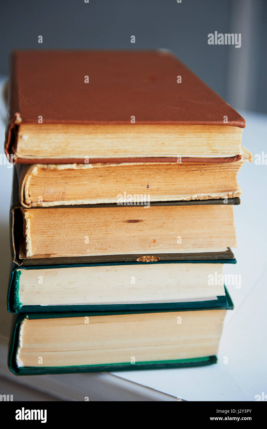 the texture is a stack of old books. Texture or background. Close up ...