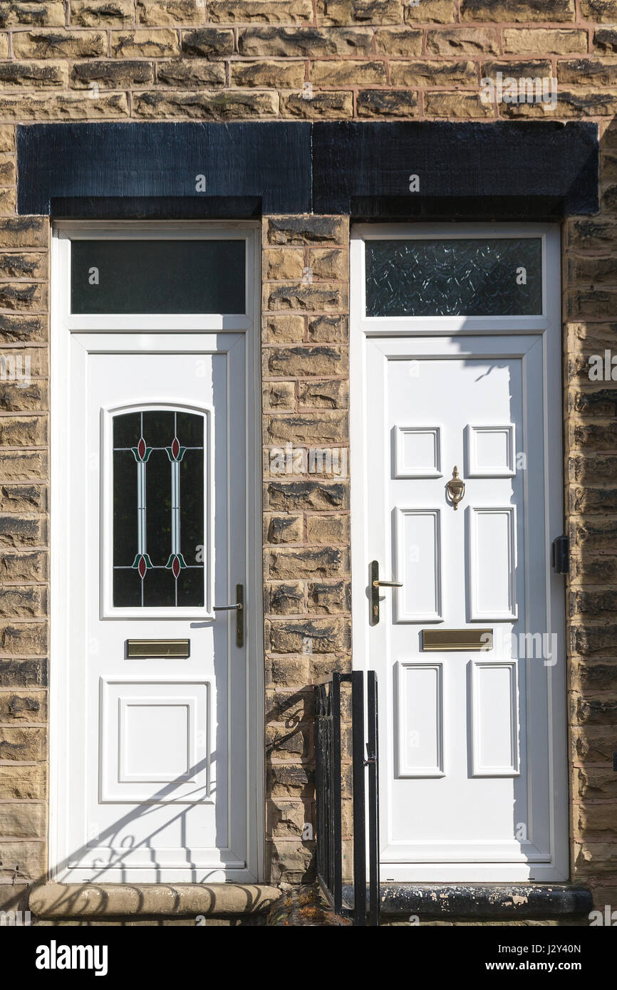 White Front Door of a Brick English Town House Stock Photo - Alamy