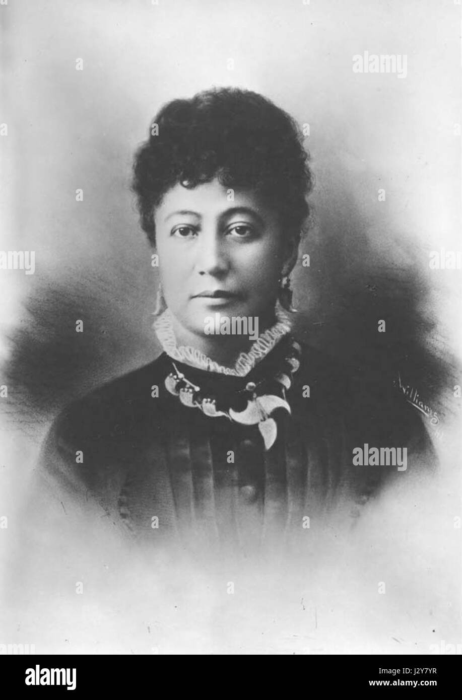 This is a retouched photograph of Bernice Pauahi Bishop, wearing a ...