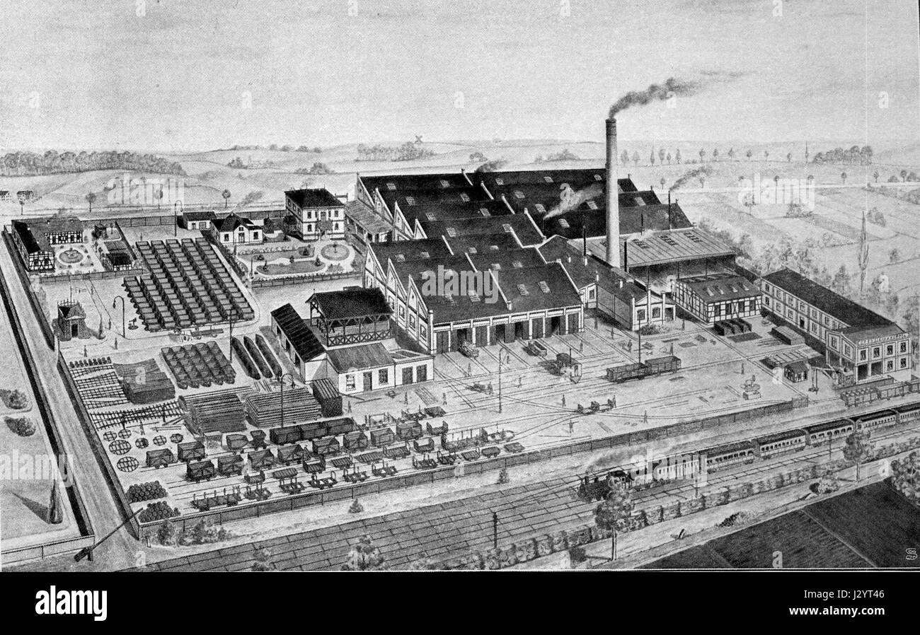 This historical photograph captures a factory in Budapest, showcasing ...