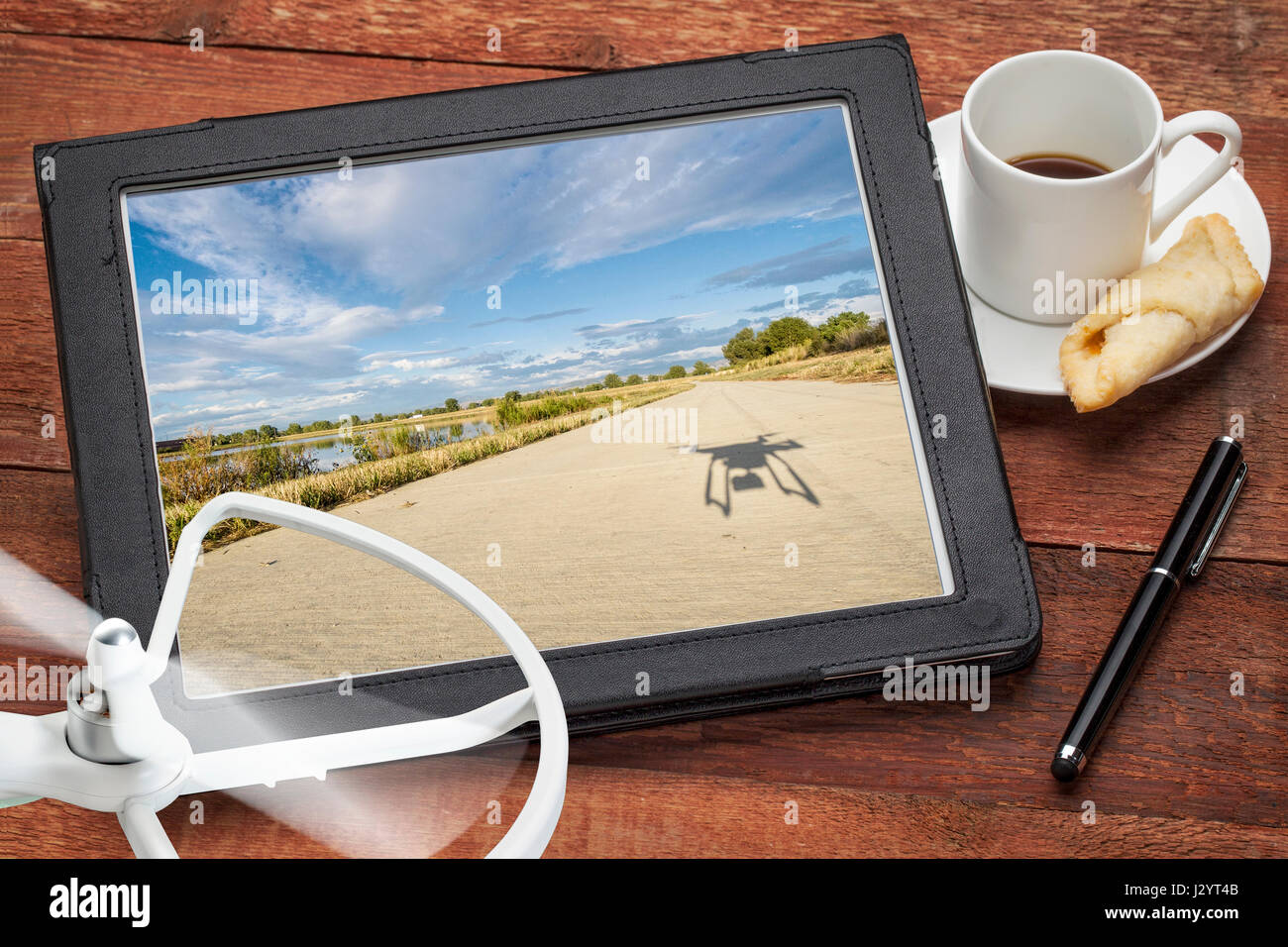 aerial photography concept with a digital tablet, drone propeller and ...