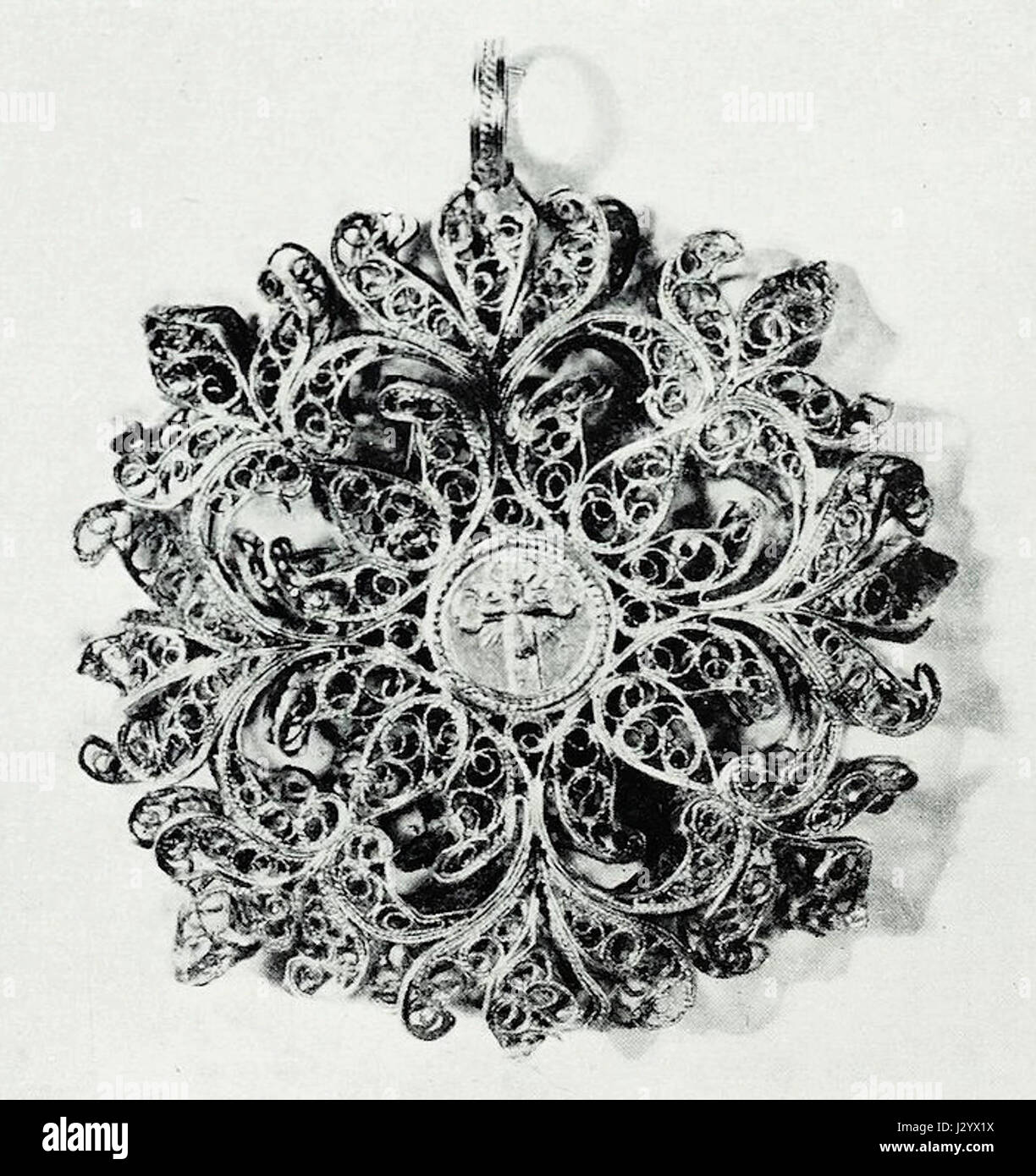 Filigree gold pendant hi-res stock photography and images - Alamy