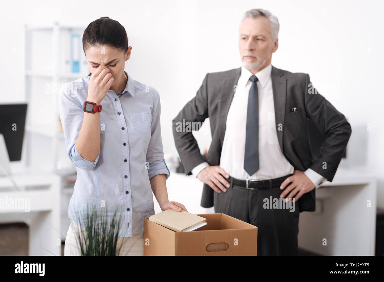 Young office worker feeling sadness Stock Photo - Alamy