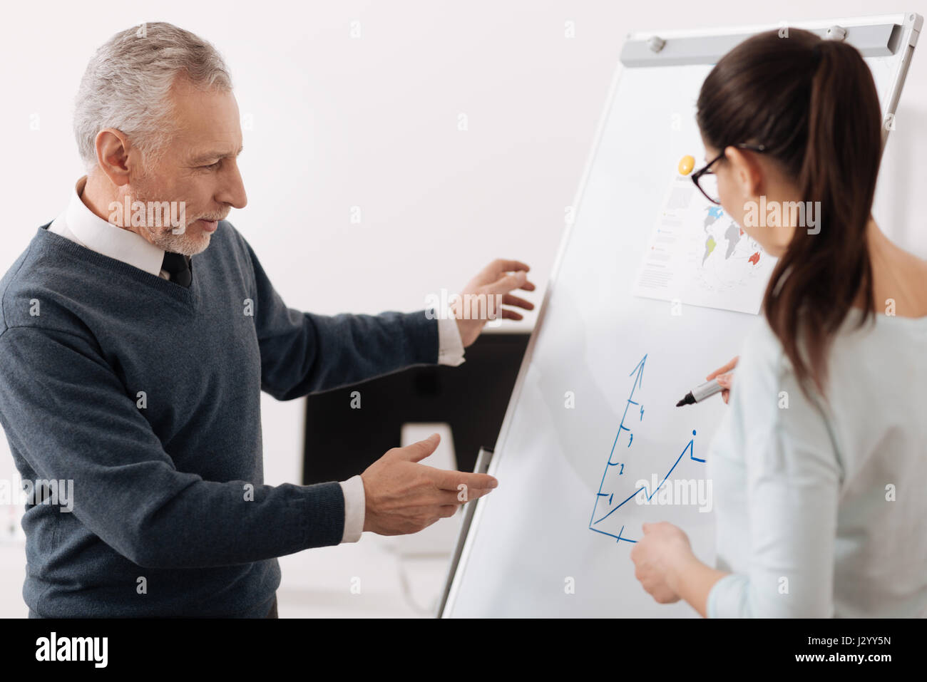 Very attentive man checking the result Stock Photo - Alamy