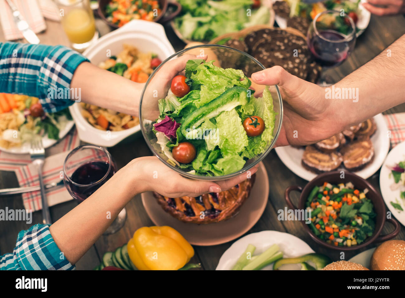 Nice family having tasty dinner Stock Photo - Alamy