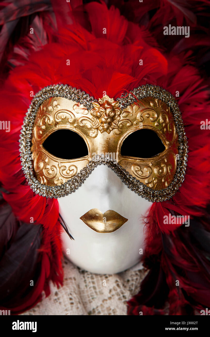 Colorful venetian mask with many details on it Stock Photo - Alamy