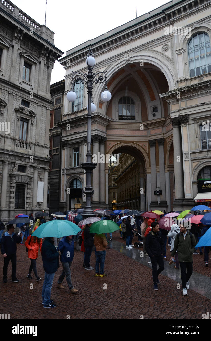 Rainy Milan, italy in front of Vittorio Emanuelle II Gallery Stock ...