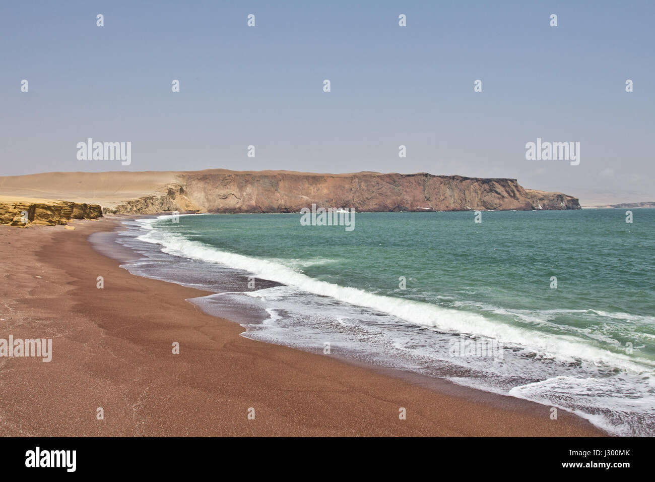 Rocky cliff and ocean with surf. Perfect place to see tropical desert ...
