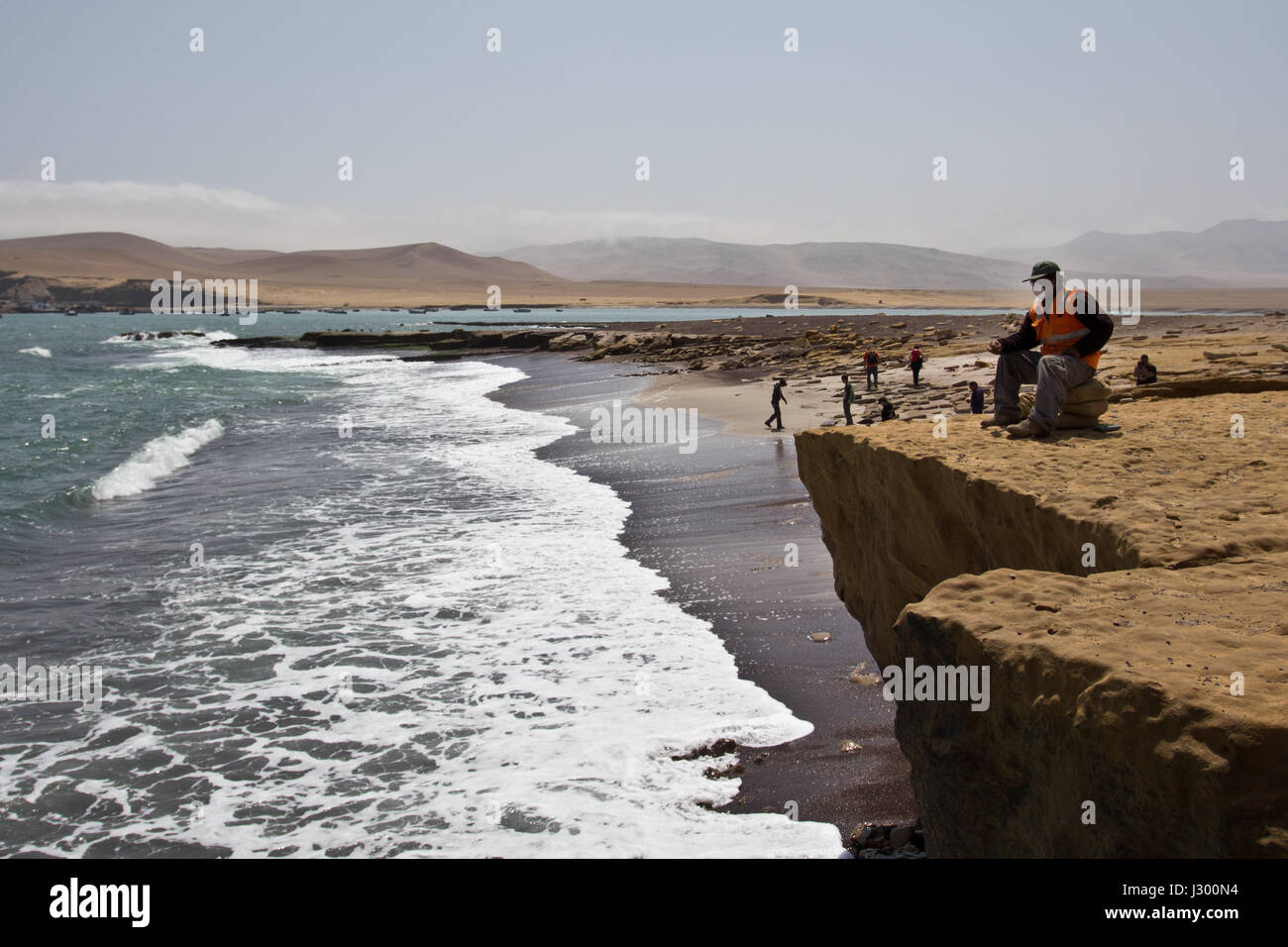 Rocky cliff and ocean with surf. Perfect place to see tropical desert ...