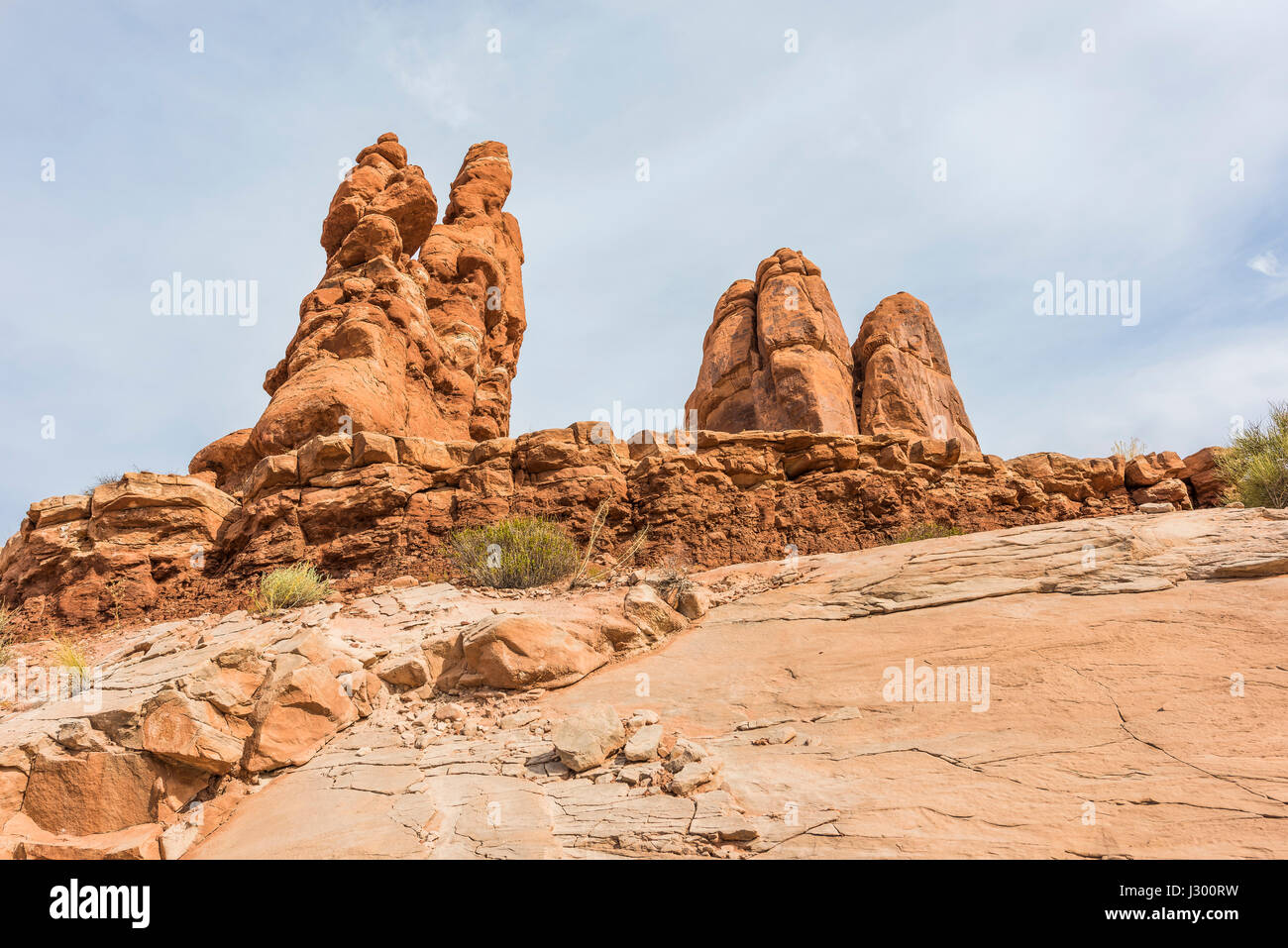 Tall red balancing rocks in Arches National Park in canyons Stock Photo ...