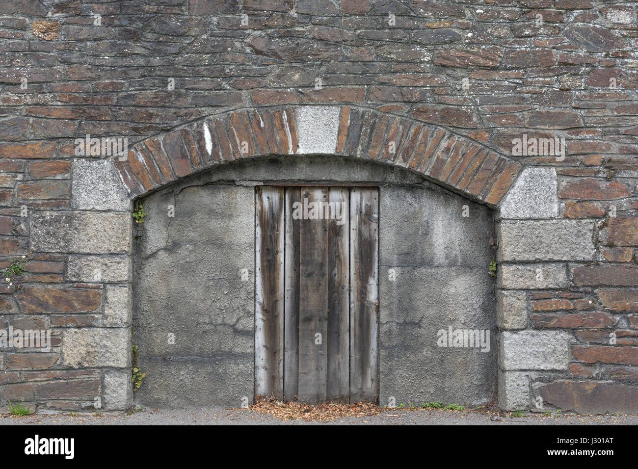Blocked doorway in arched edifice - possible metaphor for 'barring ...