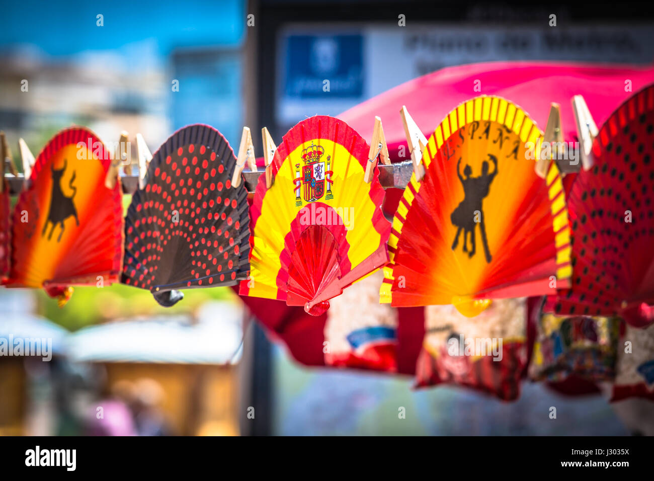 Colorful Spanish Fans arranged for sale in a store Stock Photo - Alamy