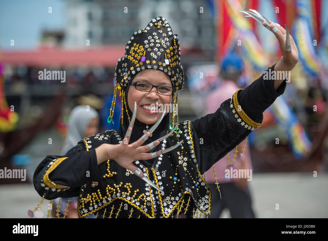 Unidentified young girl perform Traditional dance inside the Bajau's ...