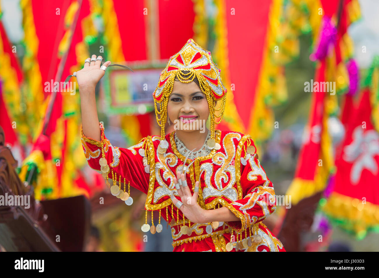 Unidentified young girl perform Traditional dance inside the Bajau's ...