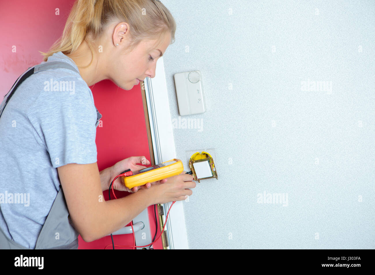 electrician testing voltage Stock Photo - Alamy
