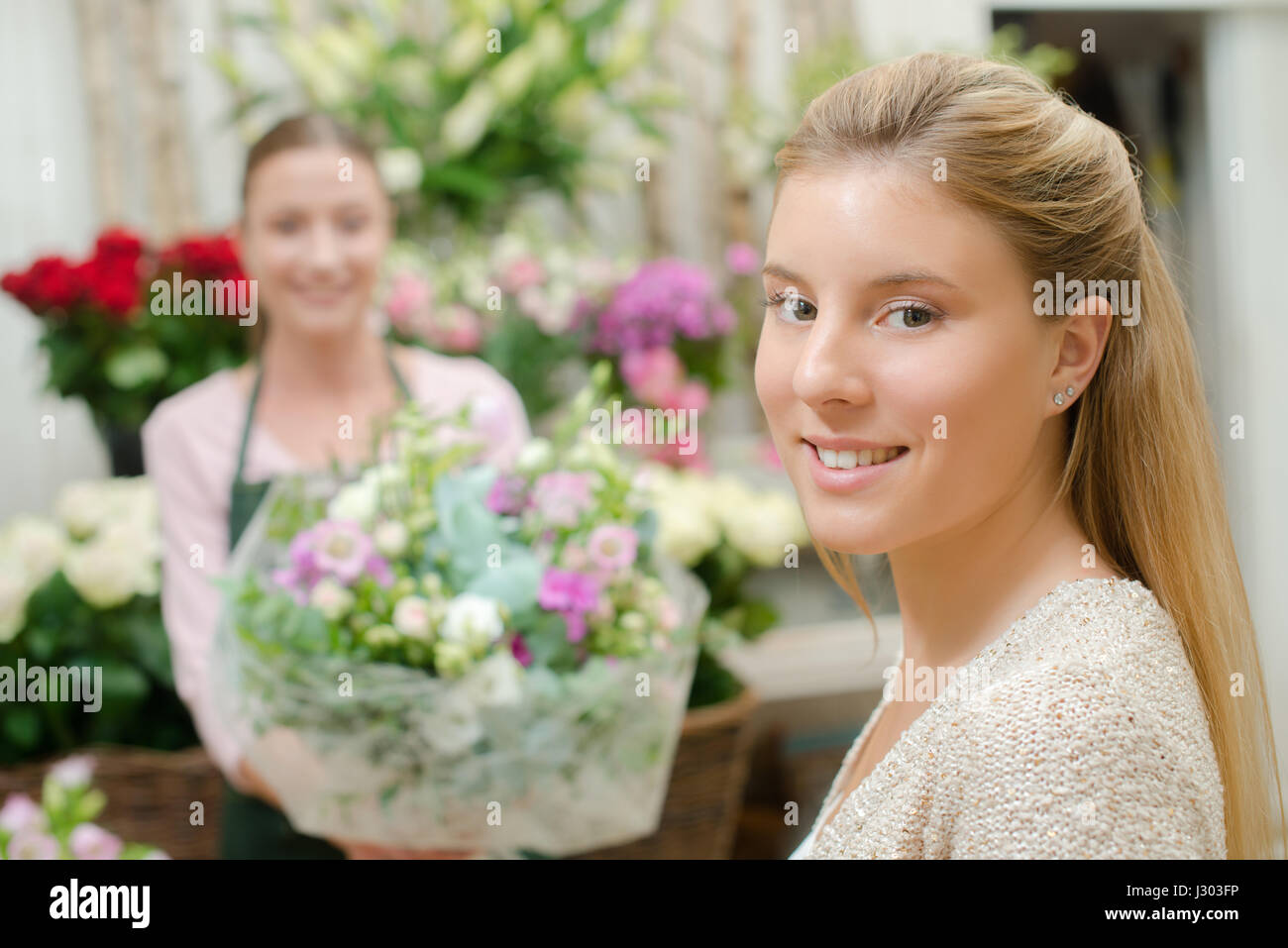 Buying some flowers Stock Photo - Alamy