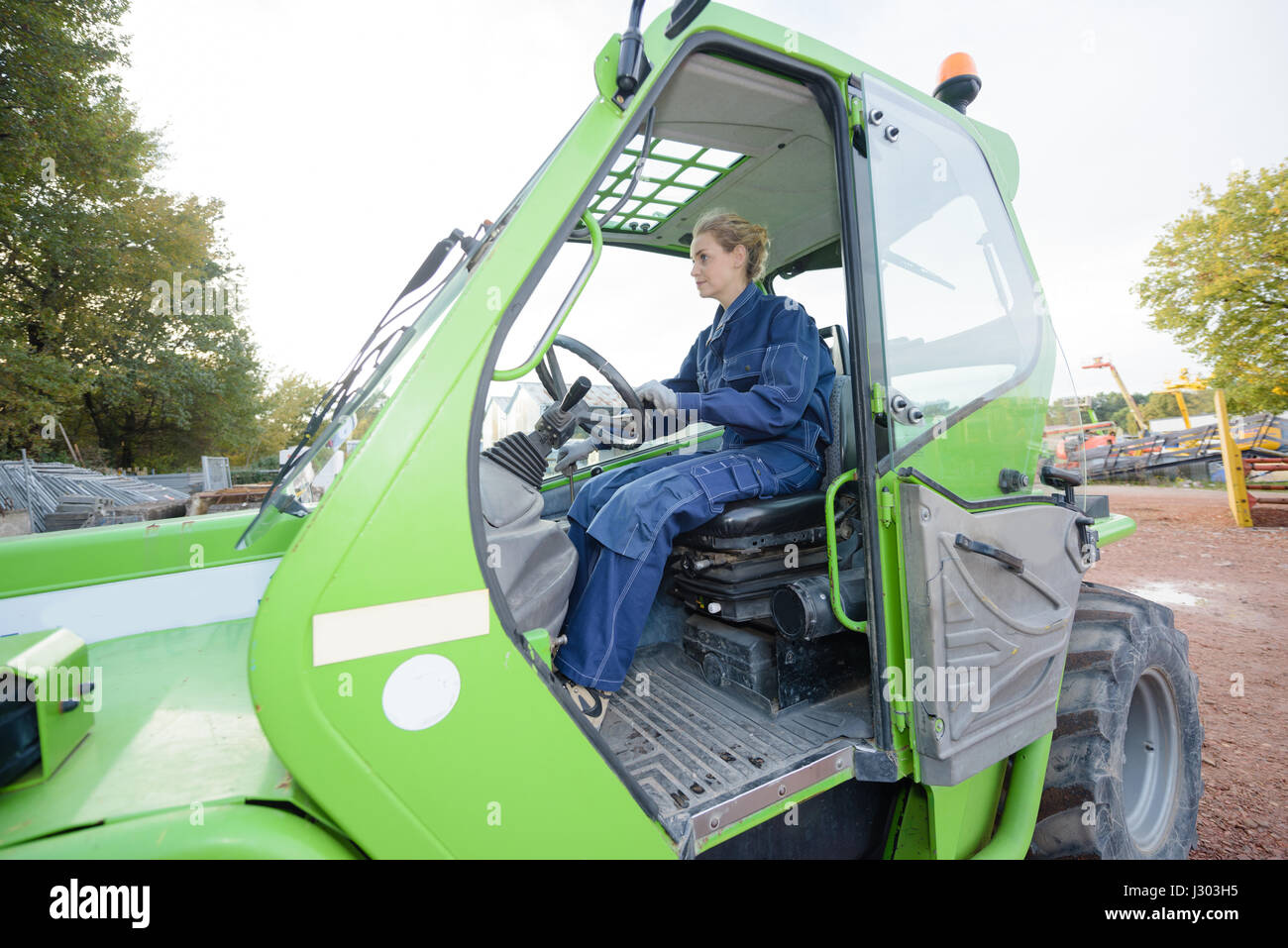 driving a construction machine Stock Photo - Alamy