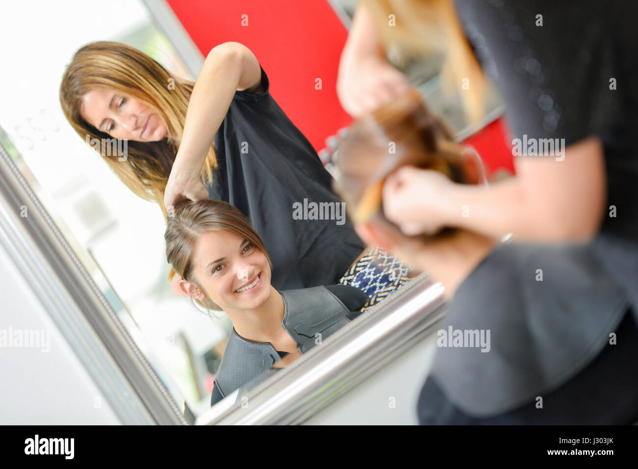 girl having a service in the parlor Stock Photo - Alamy