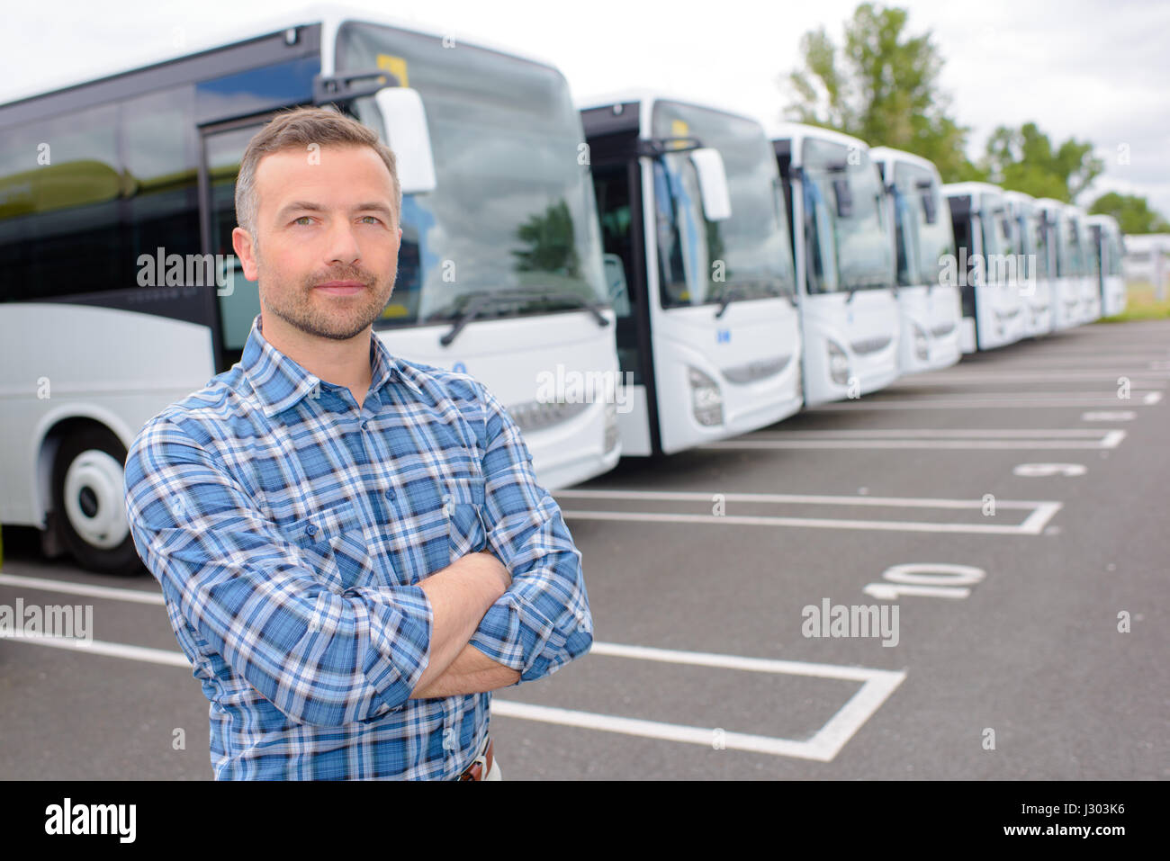 row of buses Stock Photo - Alamy