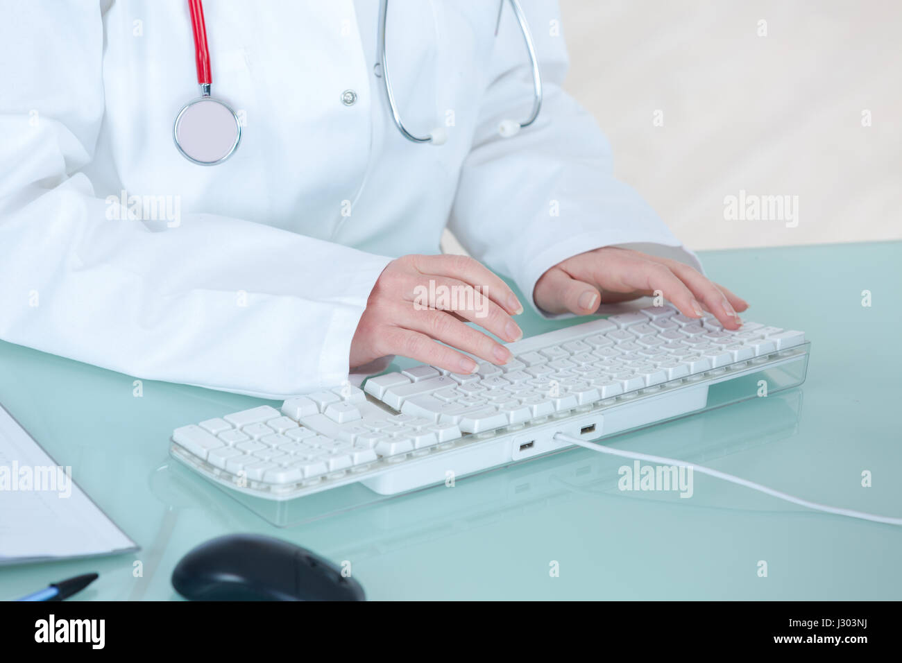 typing the health record Stock Photo - Alamy