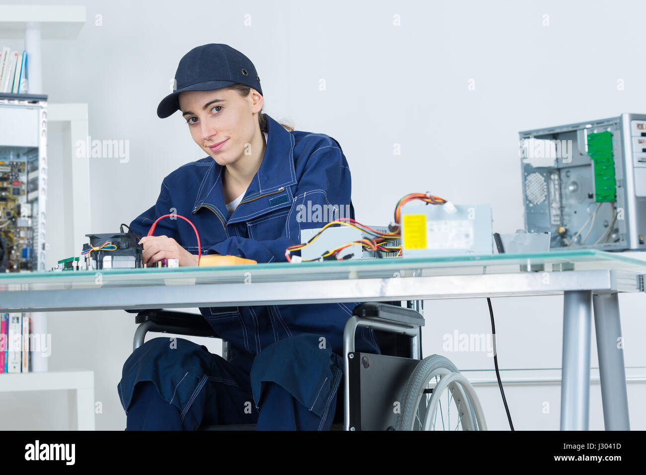 Disabled computer technician Stock Photo - Alamy