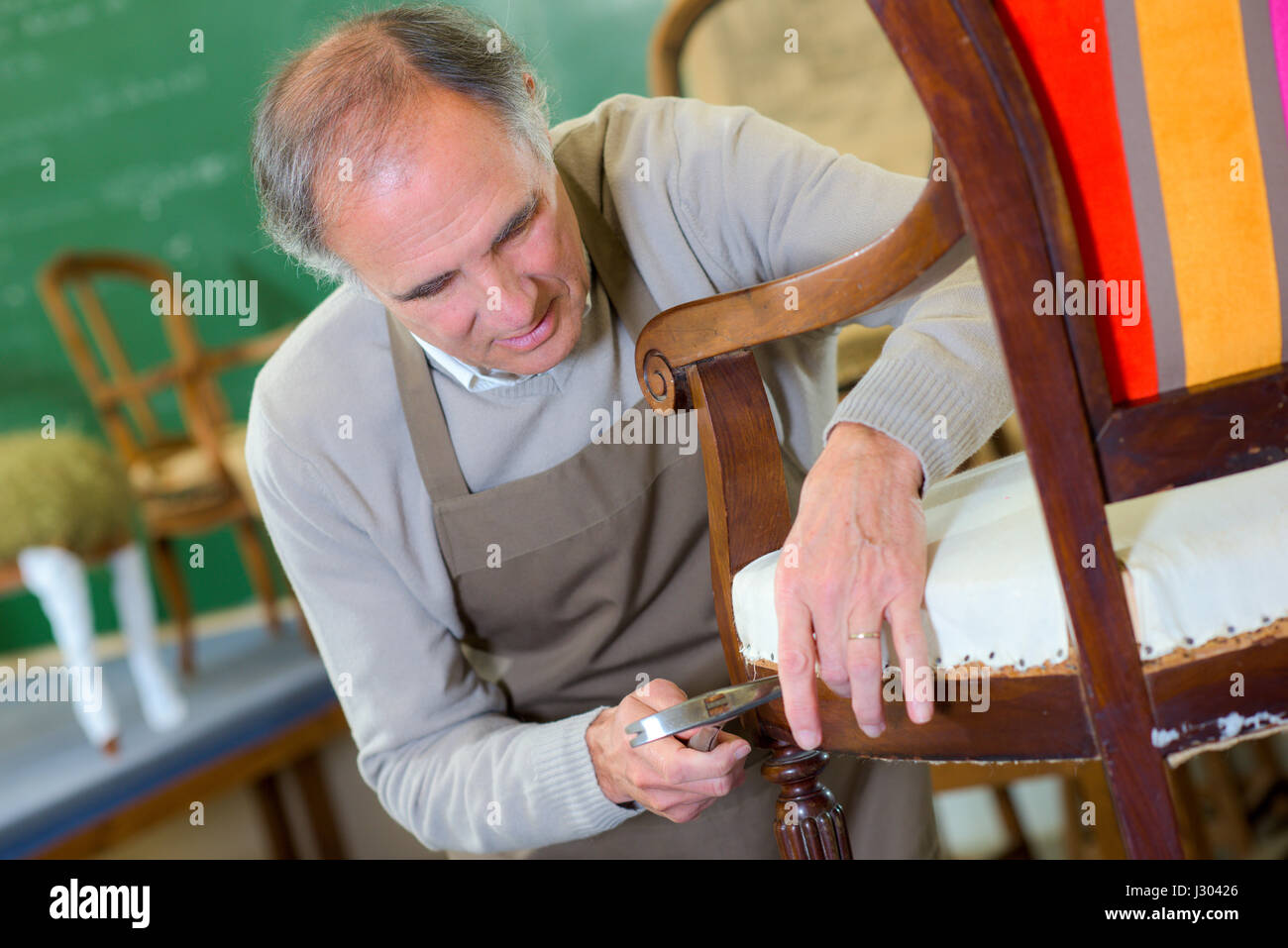 Repairing a chair Stock Photo - Alamy