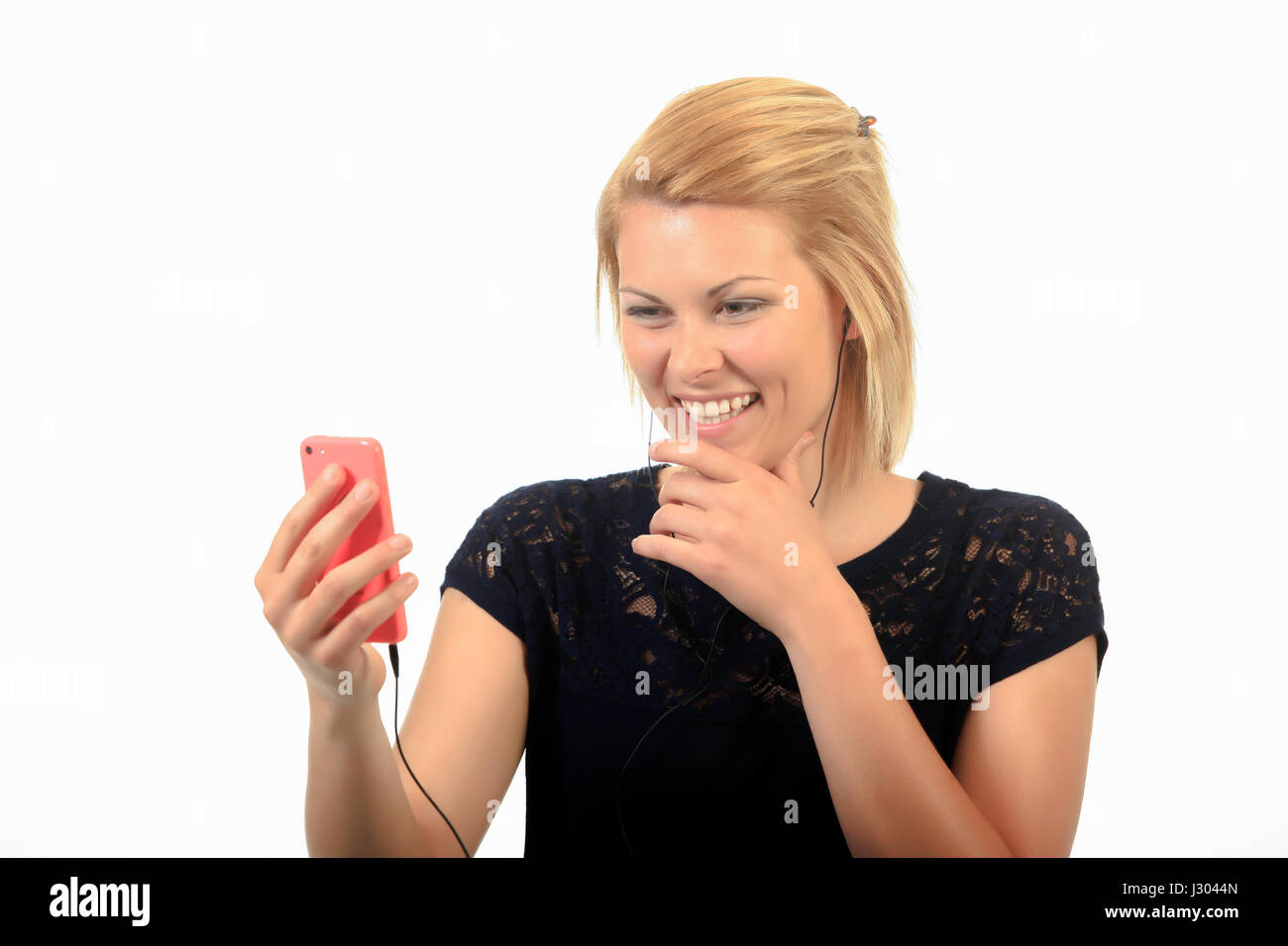 Laughing at a text message Stock Photo - Alamy