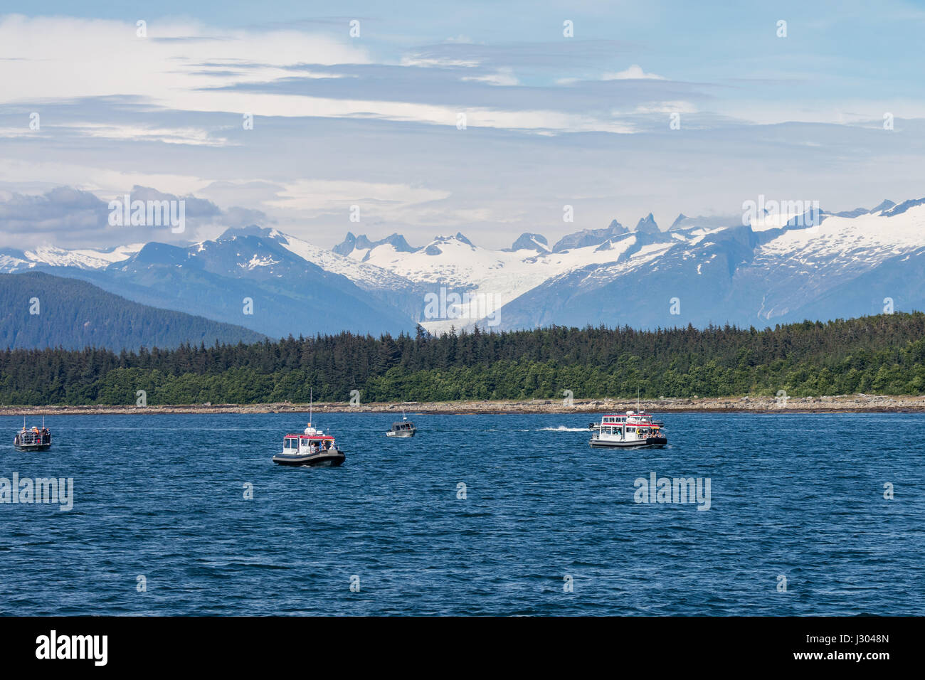 Whale Watching Boats in Alaska Stock Photo - Alamy