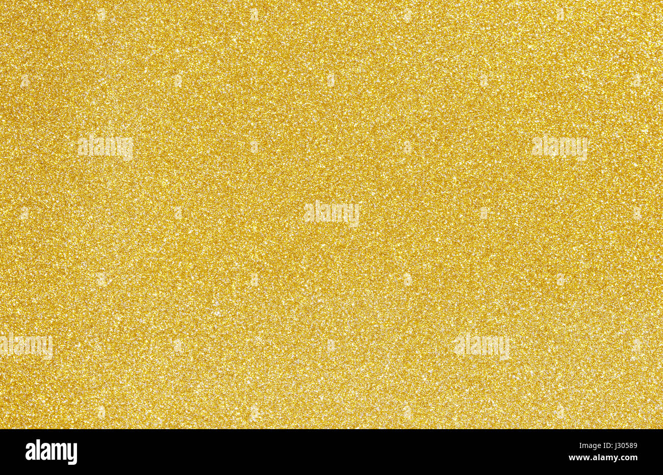 Shiny hot yellow gold foil golden color glitter decorative texture ...