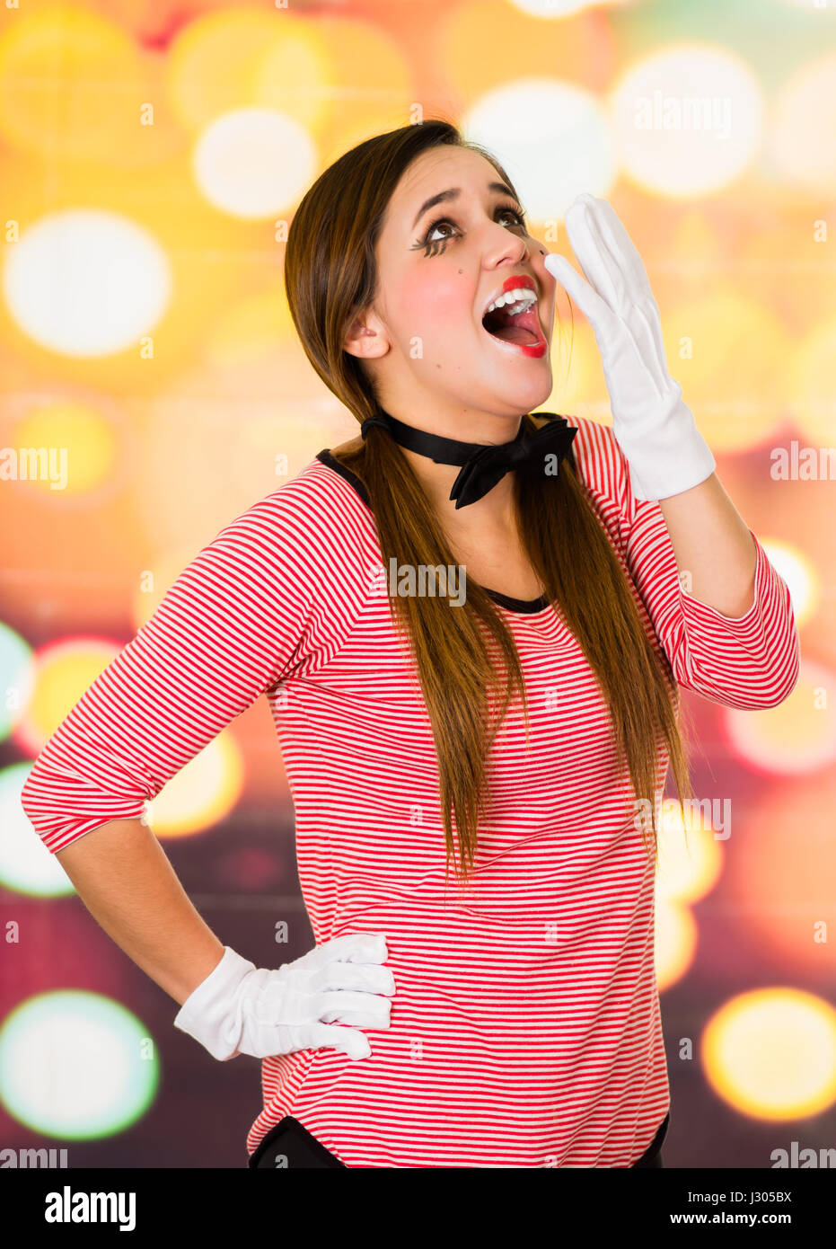Closeup portrait of female clown mime laughing Stock Photo - Alamy