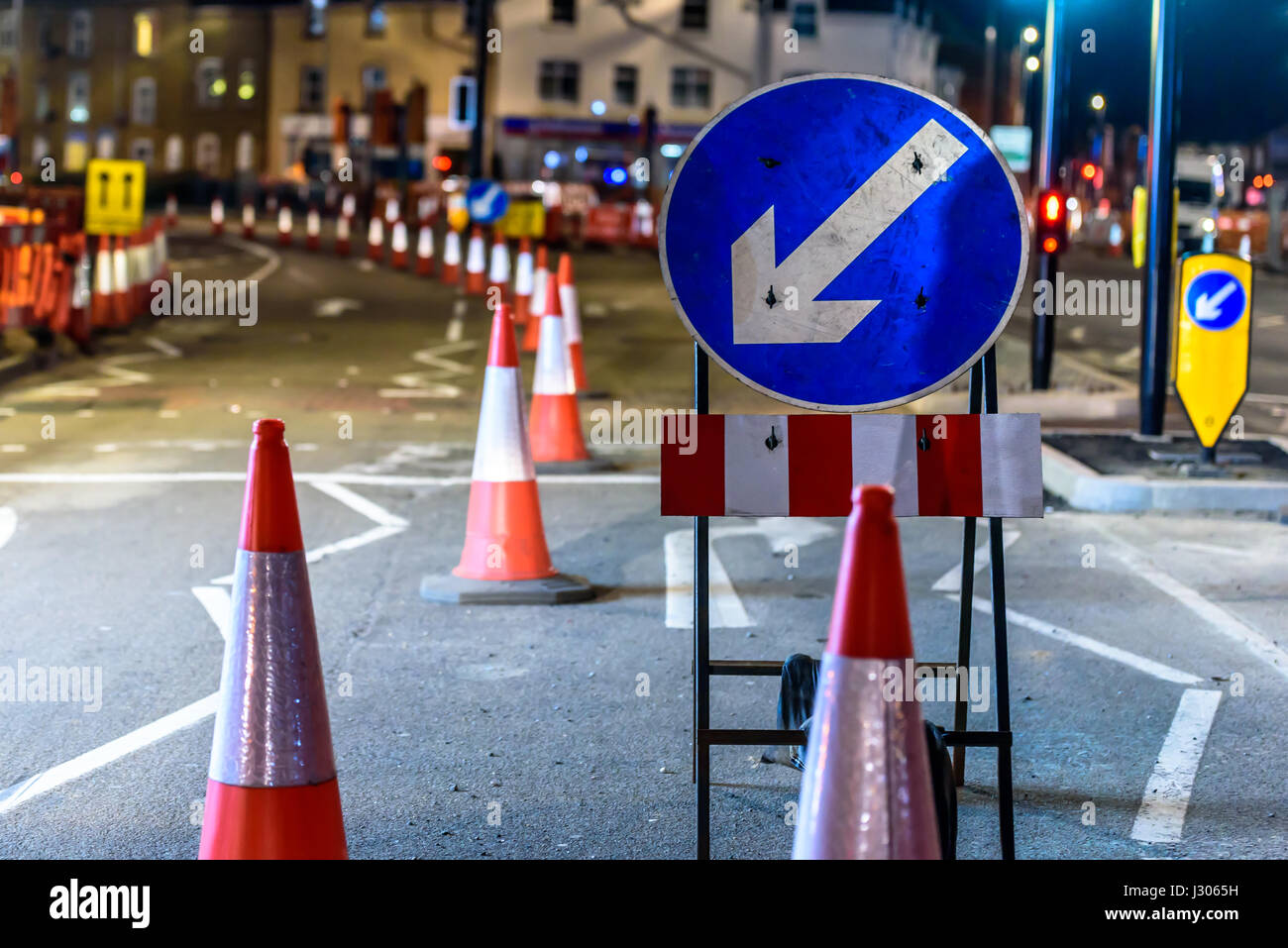 UK Road Services Roadworks Cones and Signs Stock Photo - Alamy