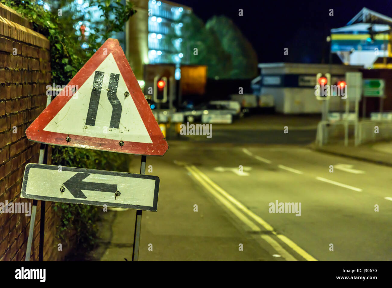 Night View Road Narrows UK Roadworks Sign Stock Photo - Alamy