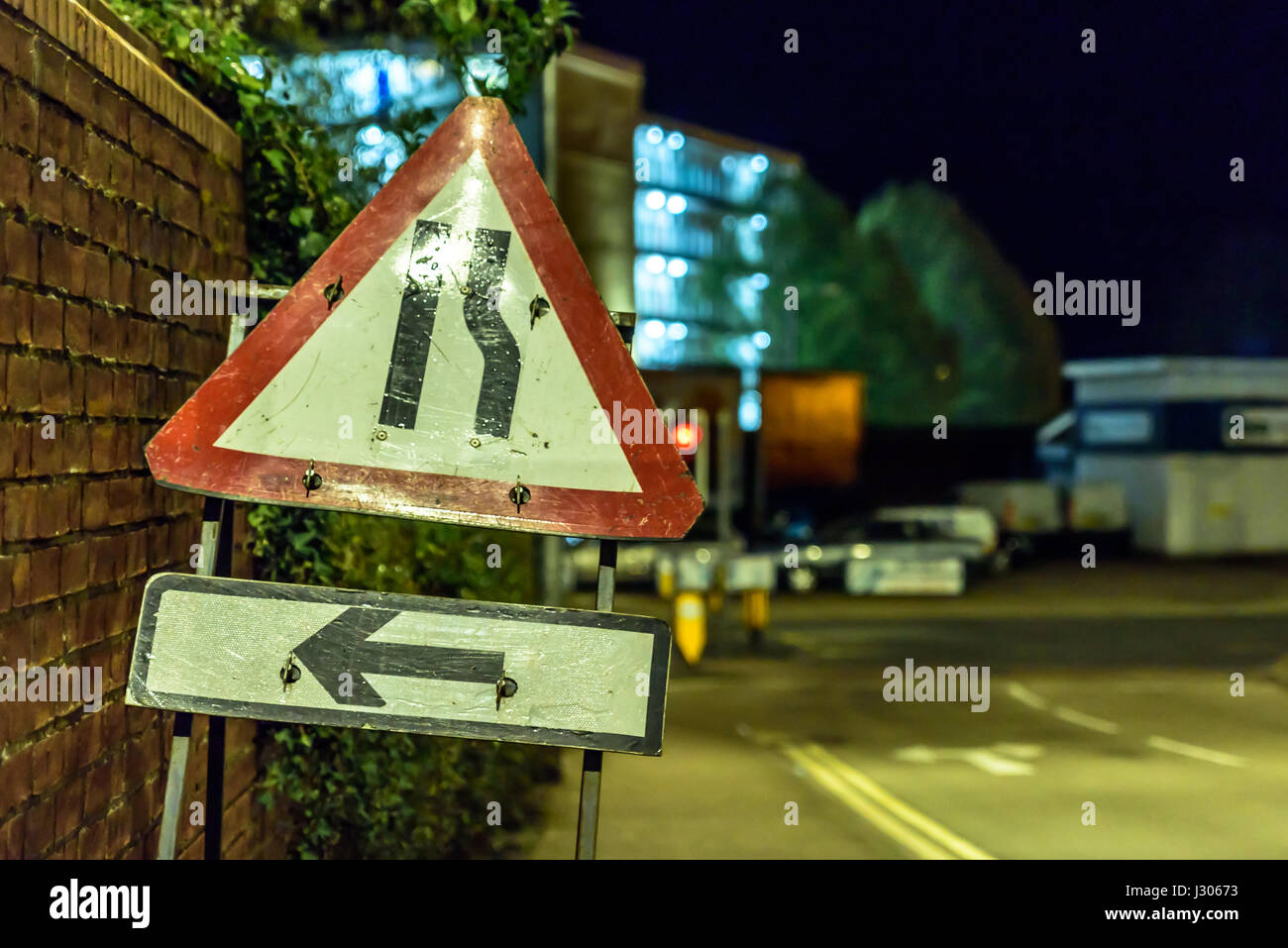 Night View Road Narrows UK Roadworks Sign Stock Photo - Alamy