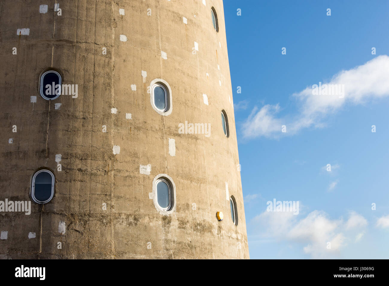 Day view stone tower windows over blue sky Stock Photo - Alamy