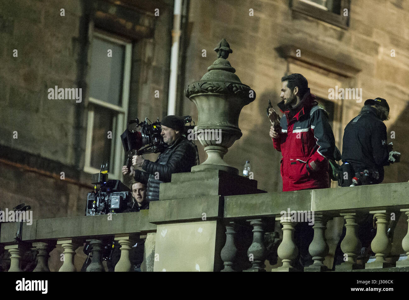 Film crew and stuntmen prepare for the filming of the upcoming movie ...