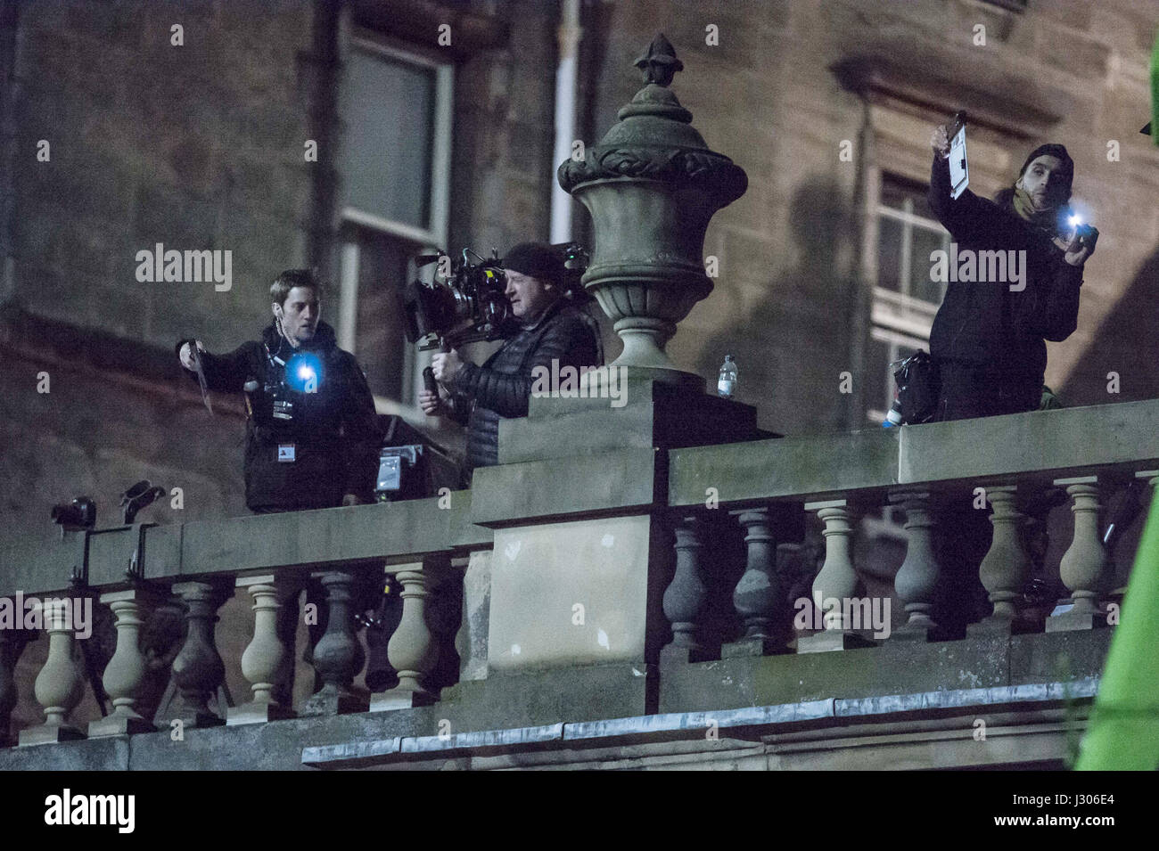 Film crew and stuntmen prepare for the filming of the upcoming movie ...