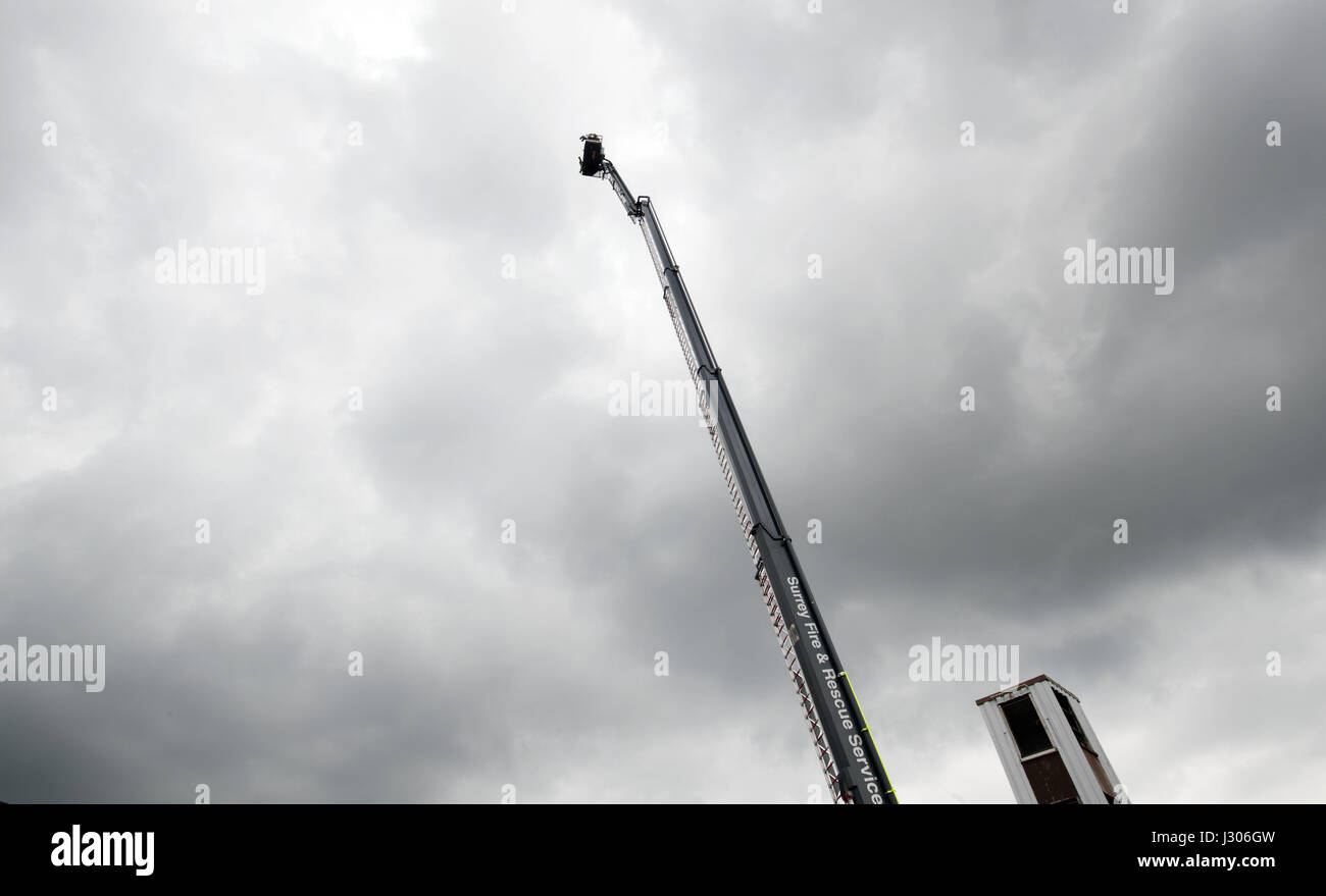 Fire fighters from Surrey Fire and Rescue Service train in Leatherhead ...