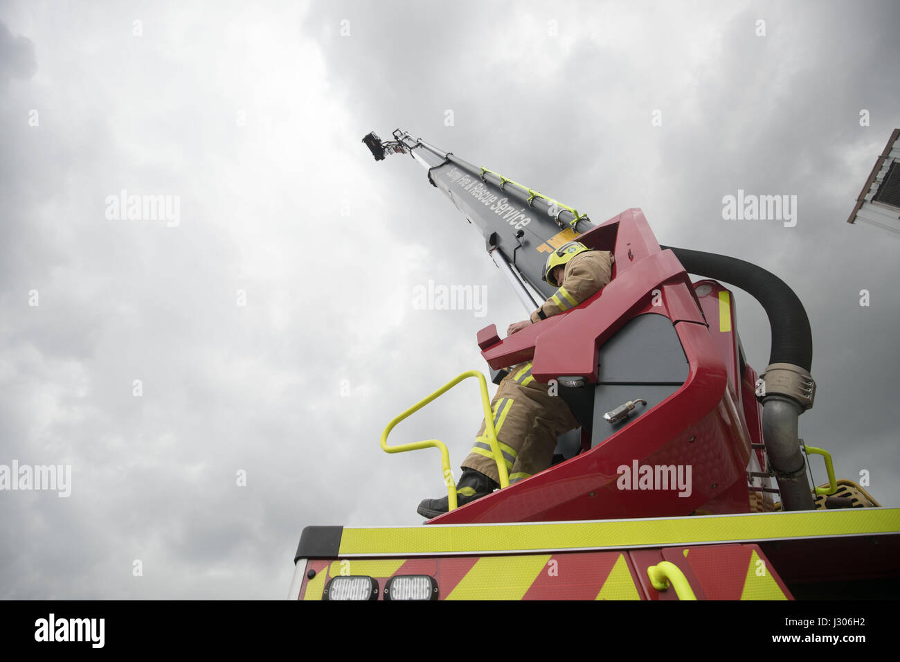 Fire fighters from surrey fire rescue service train in leatherhead hi ...