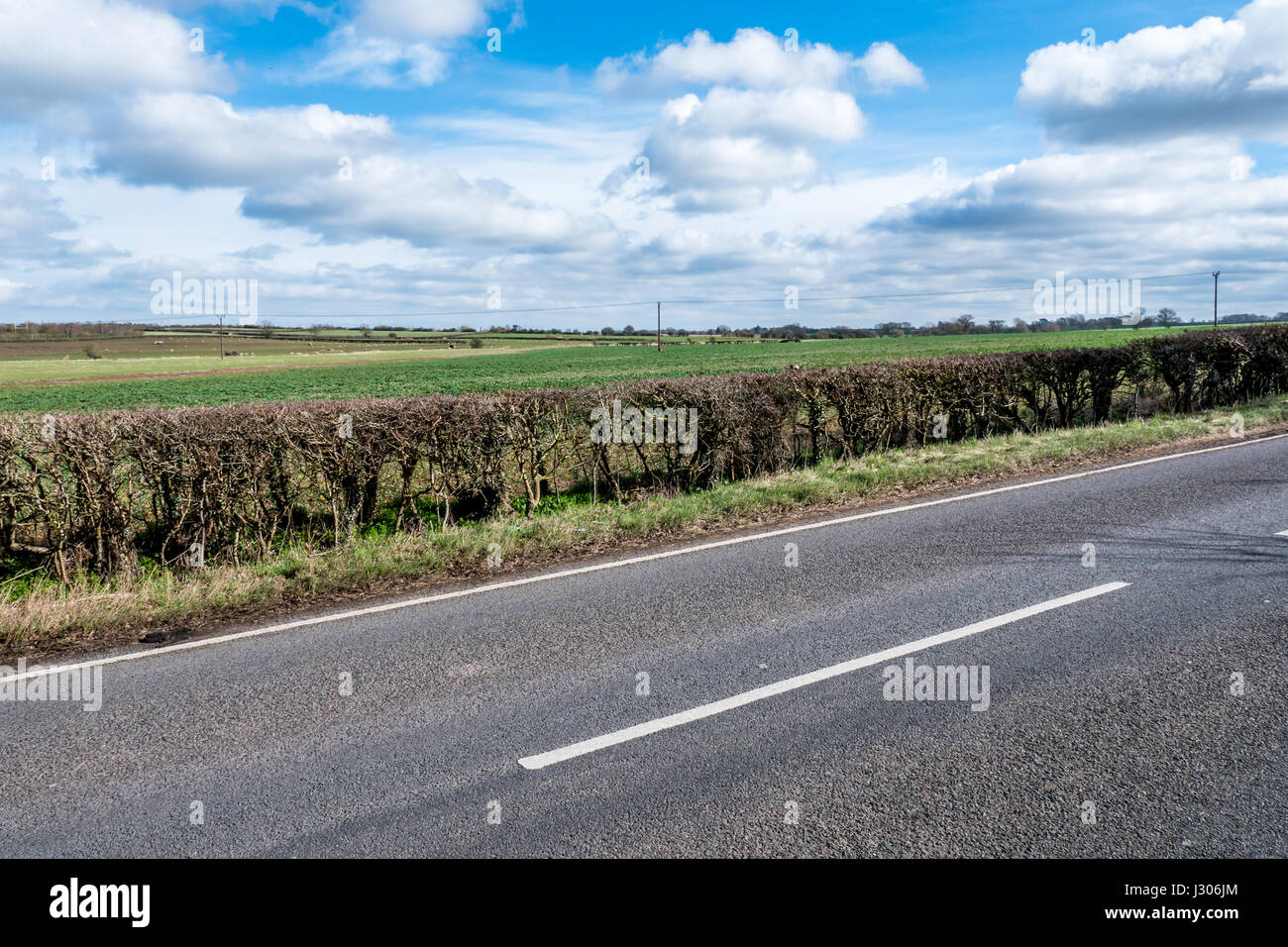 Sunny Day View of Empty UK Country Road Stock Photo - Alamy