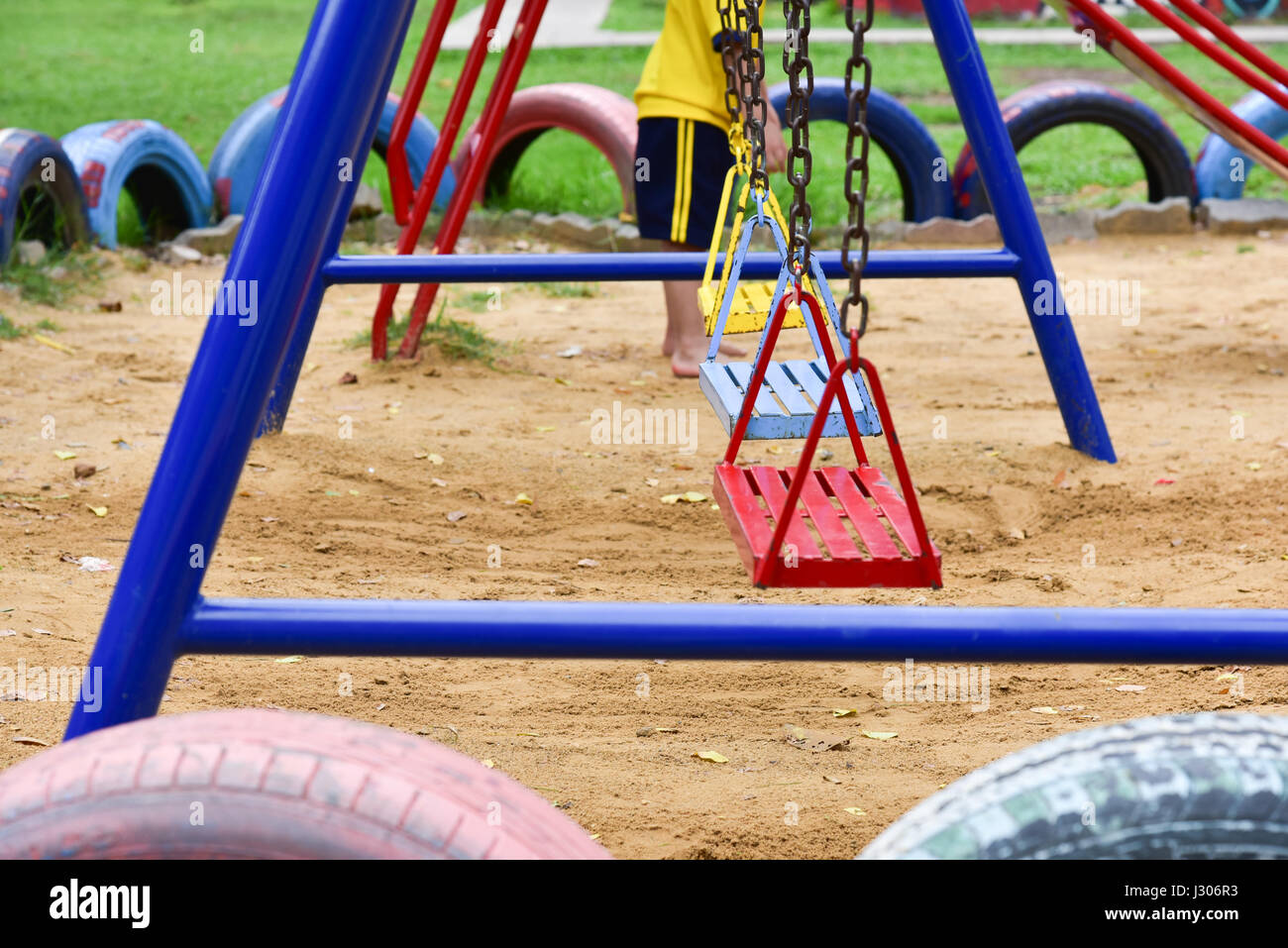 Swing-set at Playground Stock Photo - Alamy