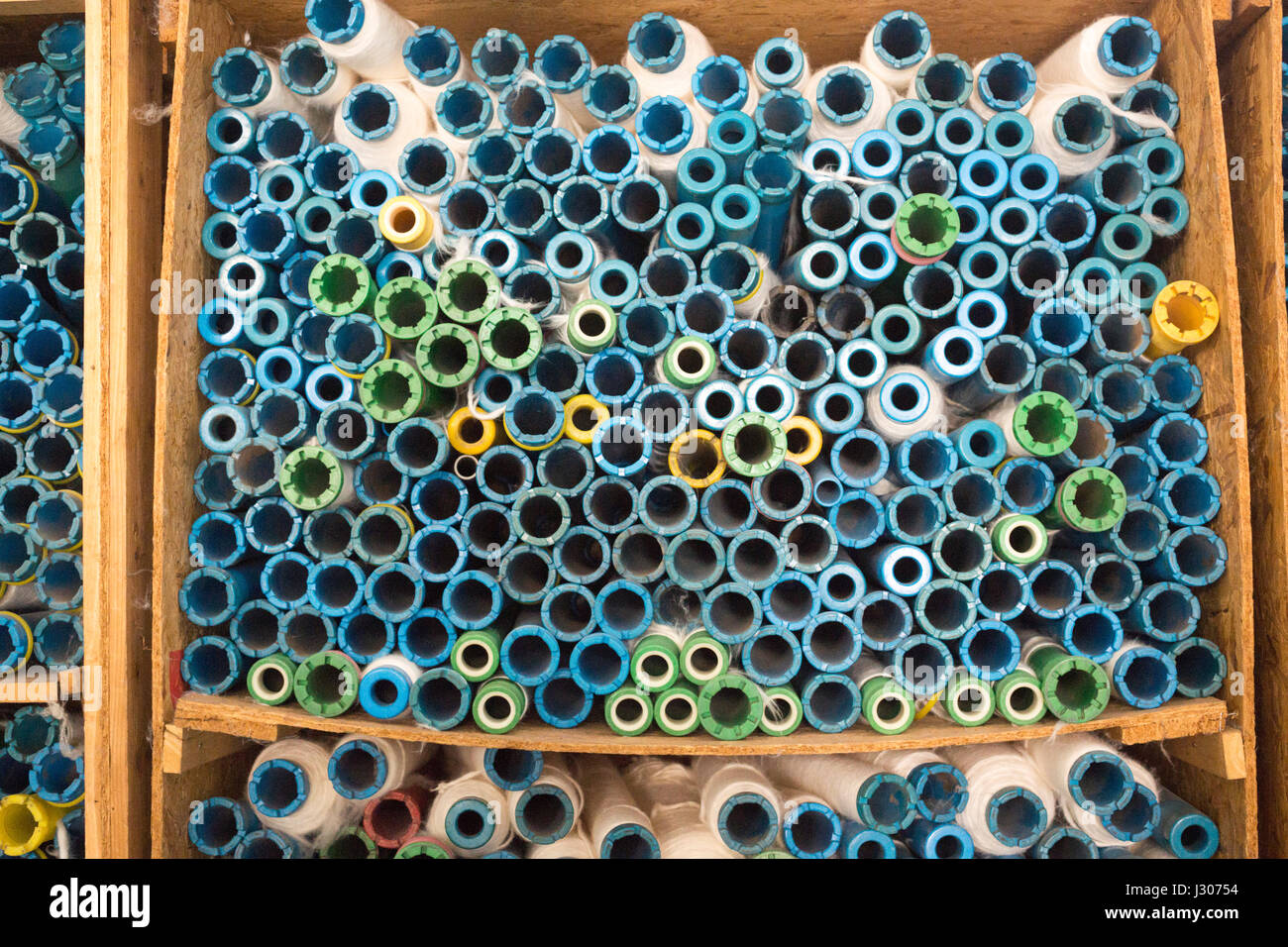 Textile workers producing clothing at a factory in Kampala, Uganda ...