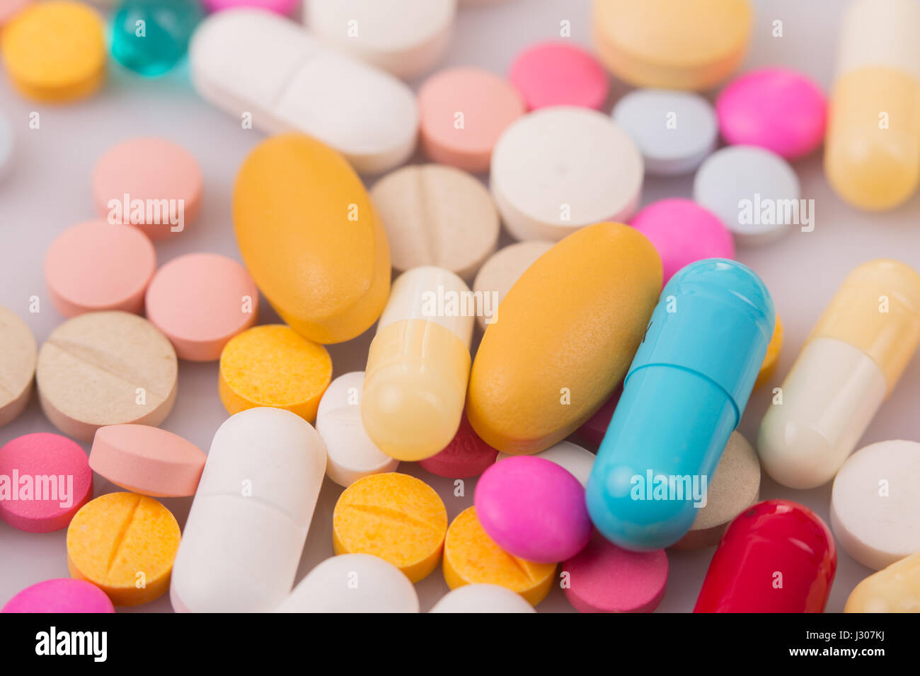 different Tablets pills capsule heap mix therapy drugs Stock Photo - Alamy