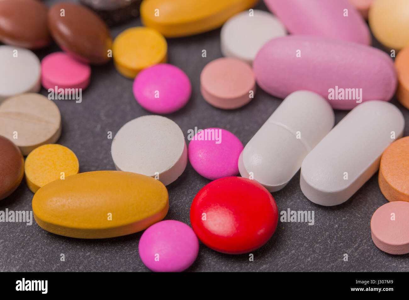 different Tablets pills capsule heap mix therapy drugs Stock Photo - Alamy