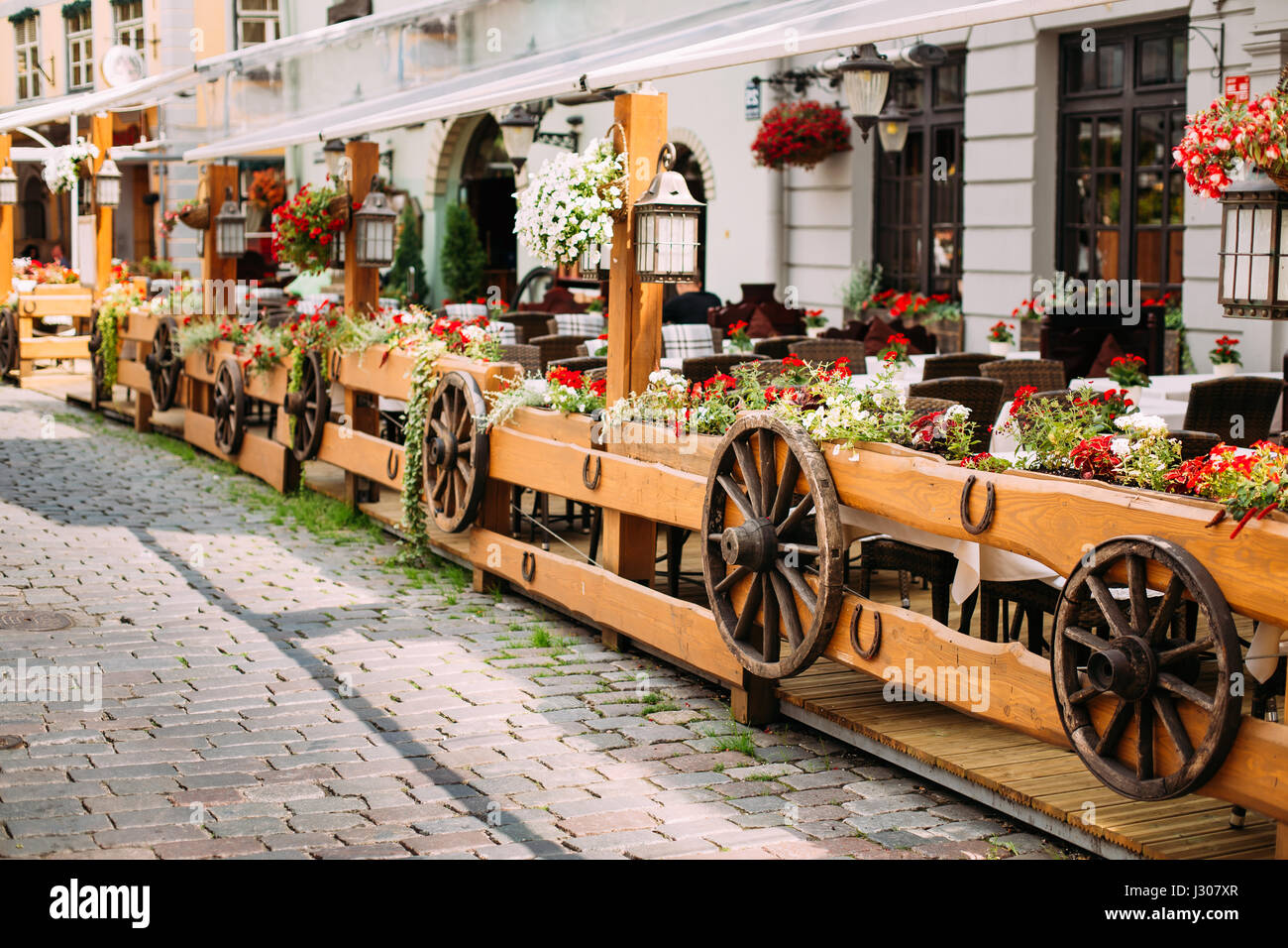 Exterior Of Cozy Outdoor Street Cafe In Retro Rural Rustic Style. On ...