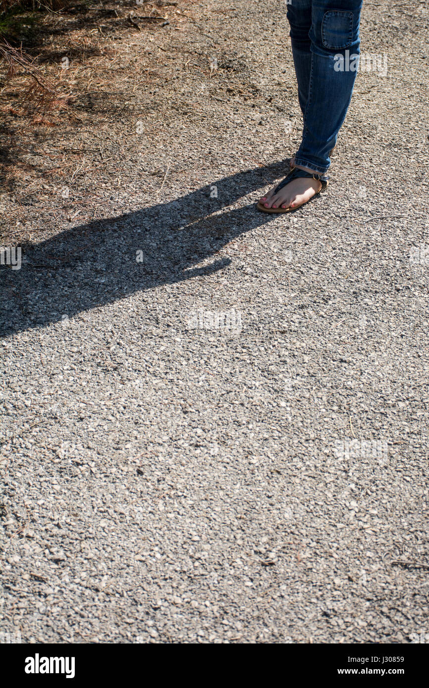 Single person standing alone hi-res stock photography and images - Alamy