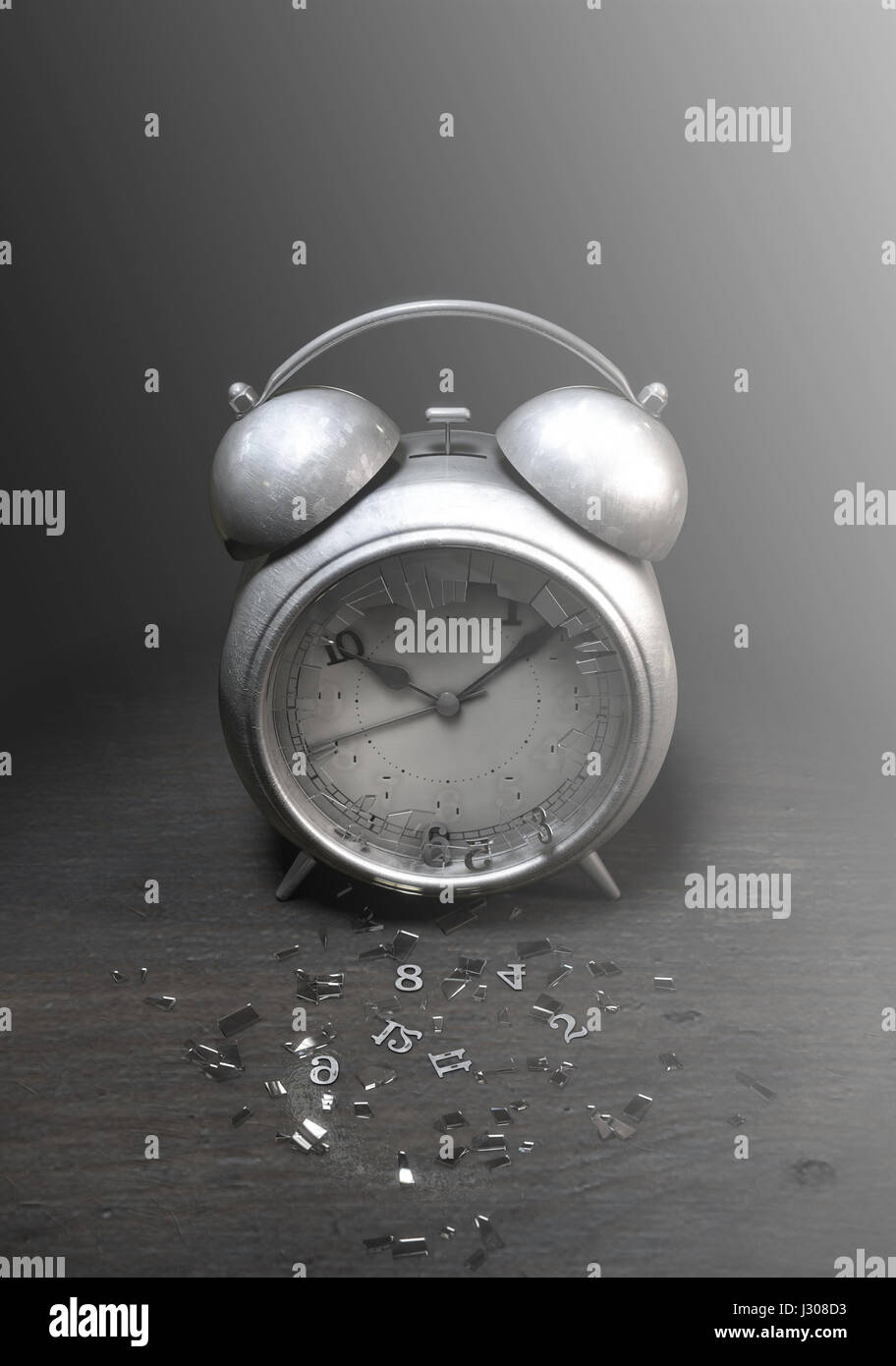 An old worn metal vintage desk clock with a smashed screen and numbers ...