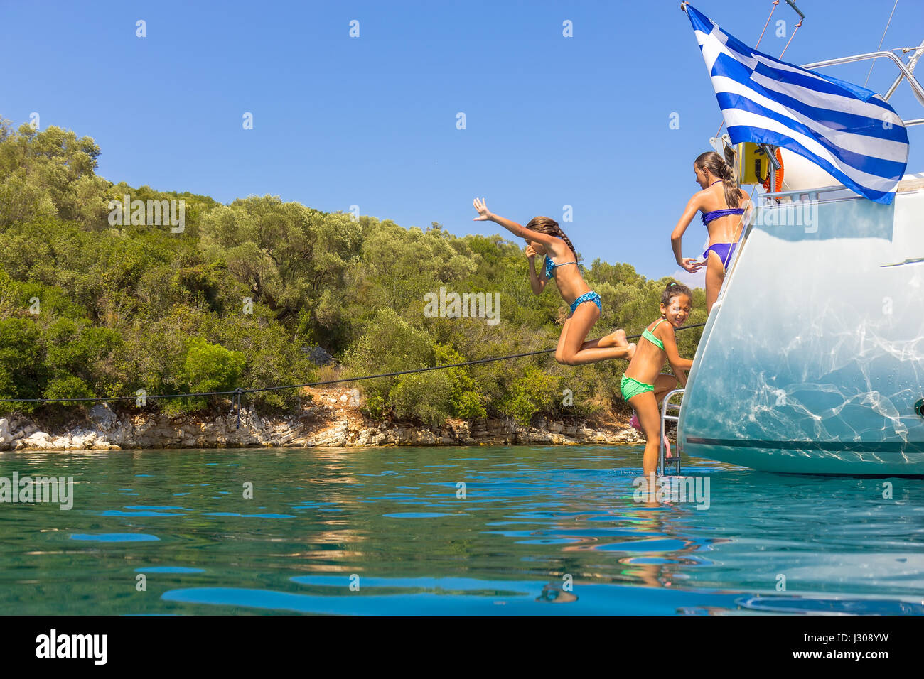 Children jumping hi-res stock photography and images - Alamy