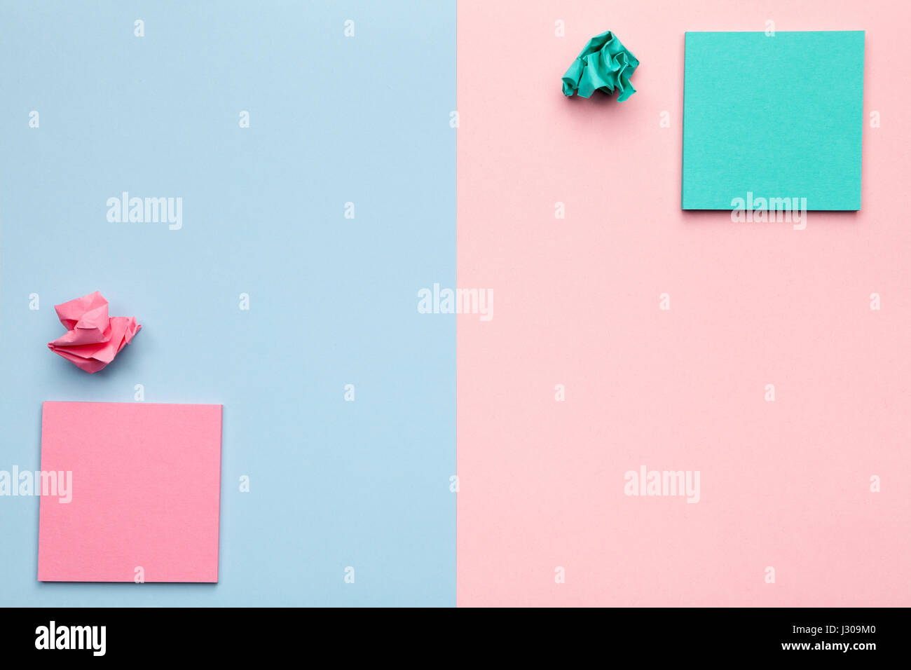 Sticky notes with crumbled paper balls on pastel background. Minimal ...