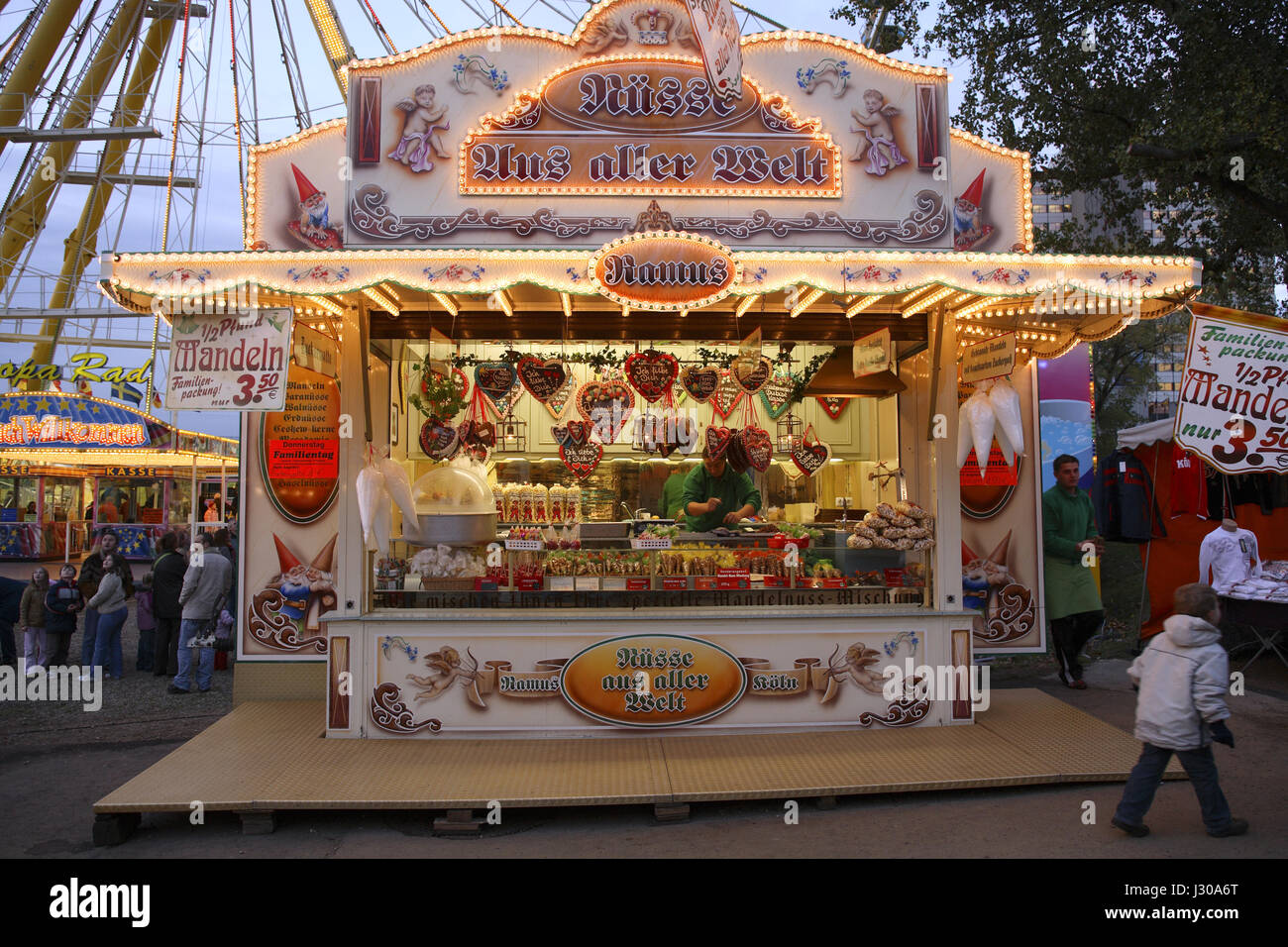 Germany, Cologne, kermis in the district Deutz, stand with nuts Stock ...